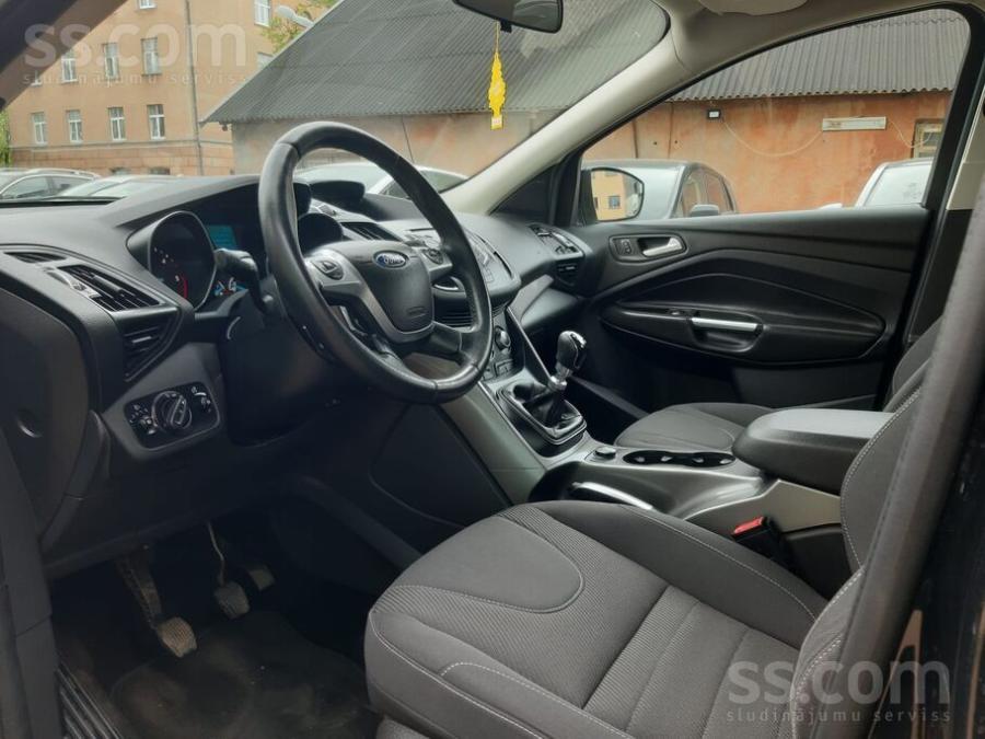 Black Ford Kuga 2016 in Daugavpils, with an engine capacity of 2.00 L and mileage of 0 thousand km for 9650 €, photo 12 on AUTOMOTO.COM.LV