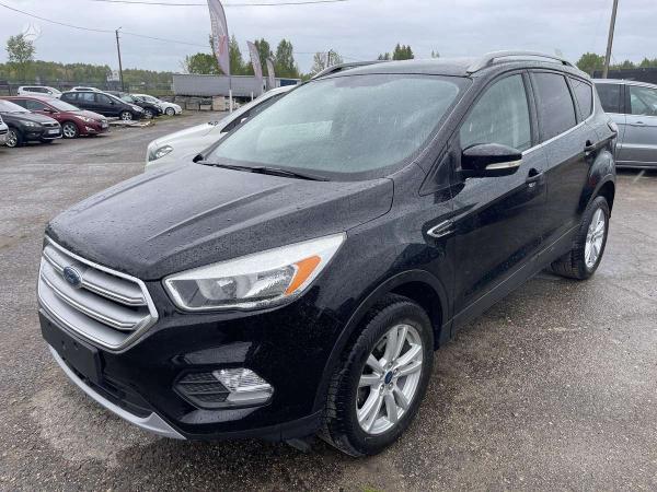 Black Ford Kuga 2016 in Panevezys, with an engine capacity of 1.50 L and mileage of 189 thousand km for 8300 €, photo 1 on AUTOMOTO.COM.LV