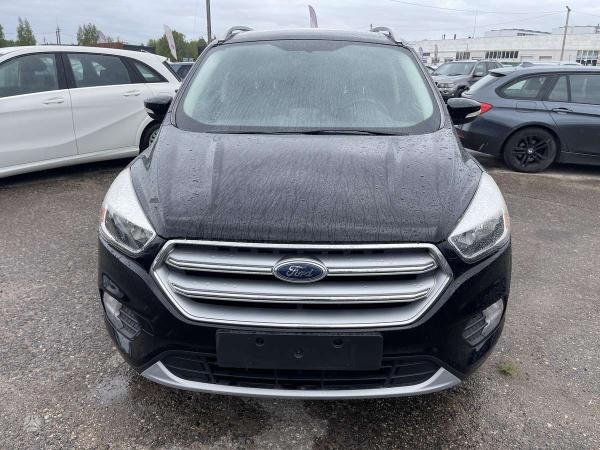 Black Ford Kuga 2016 in Panevezys, with an engine capacity of 1.50 L and mileage of 189 thousand km for 8300 €, photo 2 on AUTOMOTO.COM.LV