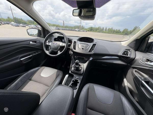 Black Ford Kuga 2016 in Marijampole, with an engine capacity of 1.50 L and mileage of 229 thousand km for 6200 €, photo 9 on AUTOMOTO.COM.LV