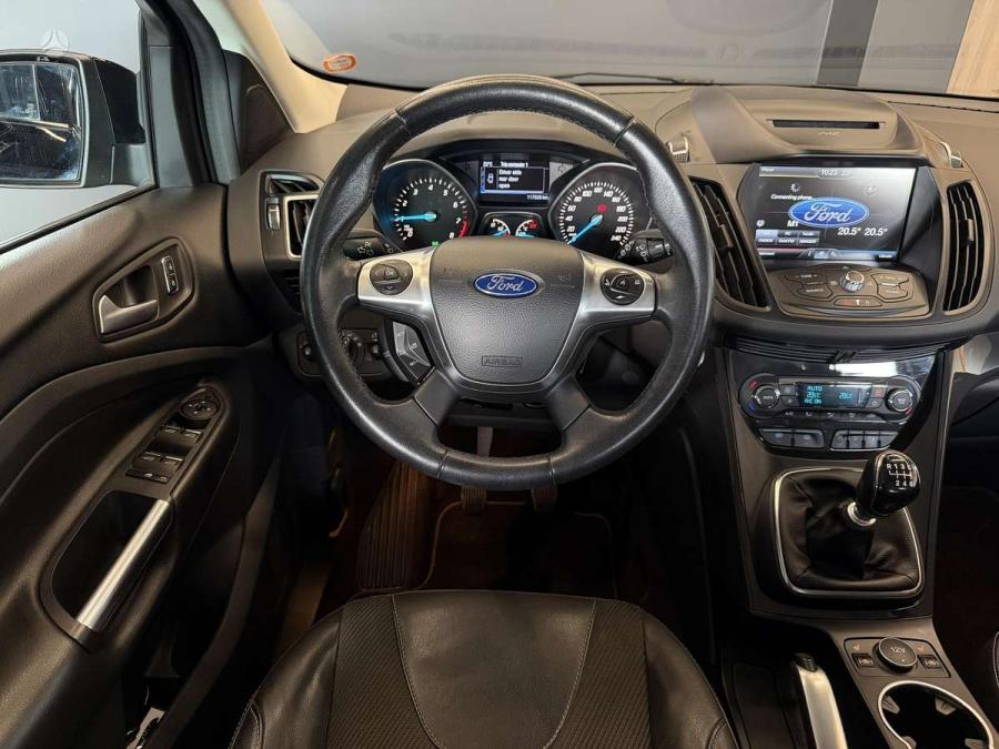 Black Ford Kuga 2016 in Kaunas, with an engine capacity of 1.50 L and mileage of 117 thousand km for 8990 €, photo 16 on AUTOMOTO.COM.LV