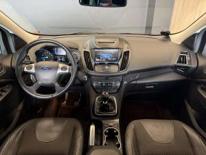 Black Ford Kuga 2016 in Kaunas, with an engine capacity of 1.50 L and mileage of 117 thousand km for 8990 €, photo 17 on AUTOMOTO.COM.LV