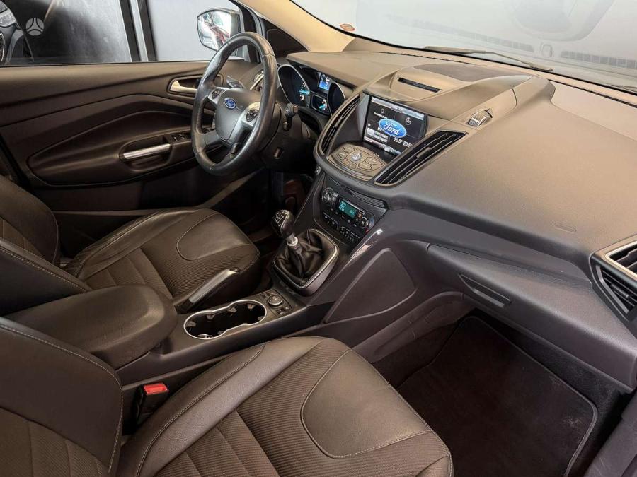 Black Ford Kuga 2016 in Kaunas, with an engine capacity of 1.50 L and mileage of 117 thousand km for 8990 €, photo 18 on AUTOMOTO.COM.LV