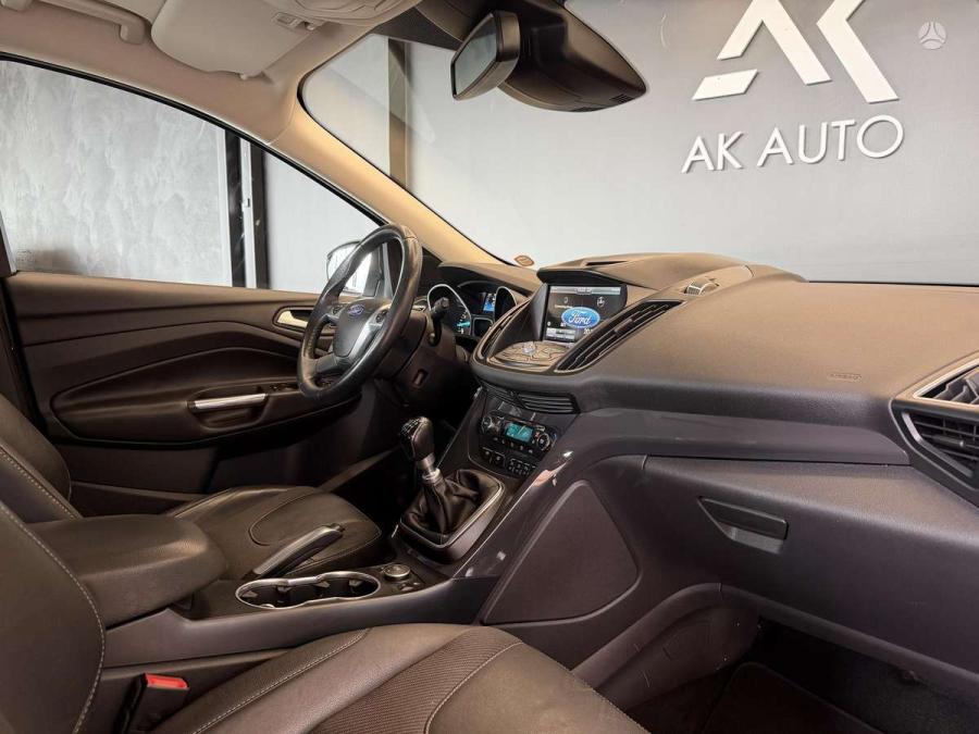 Black Ford Kuga 2016 in Kaunas, with an engine capacity of 1.50 L and mileage of 117 thousand km for 8990 €, photo 19 on AUTOMOTO.COM.LV
