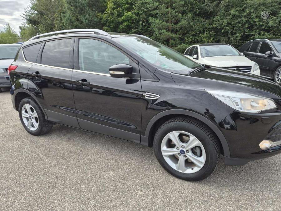 Black Ford Kuga 2016 in Utena, with an engine capacity of 1.50 L and mileage of 151 thousand km for 8650 €, photo 13 on AUTOMOTO.COM.LV