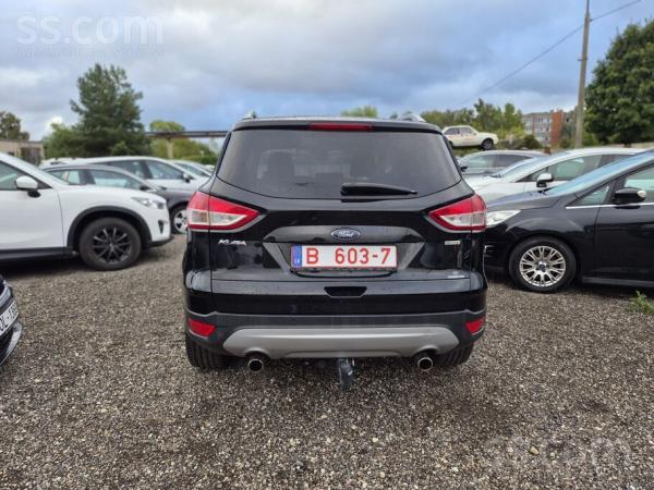 Black Ford Kuga 2016 in Daugavpils, with an engine capacity of 1.50 L and mileage of 0 thousand km for 6950 €, photo 8 on AUTOMOTO.COM.LV