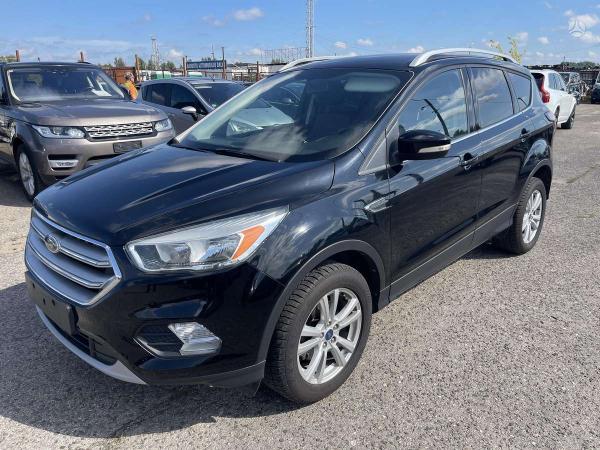 Black Ford Kuga 2016 in Panevezys, with an engine capacity of 1.50 L and mileage of 189 thousand km for 8000 €, photo 1 on AUTOMOTO.COM.LV