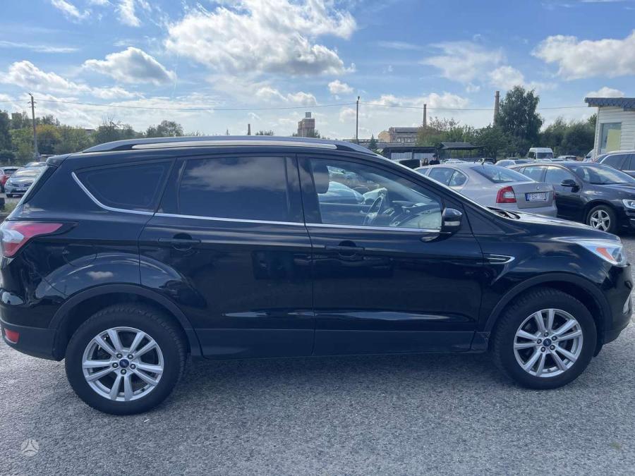 Black Ford Kuga 2016 in Panevezys, with an engine capacity of 1.50 L and mileage of 189 thousand km for 8000 €, photo 5 on AUTOMOTO.COM.LV