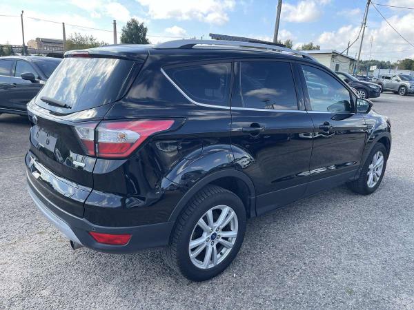 Black Ford Kuga 2016 in Panevezys, with an engine capacity of 1.50 L and mileage of 189 thousand km for 8000 €, photo 6 on AUTOMOTO.COM.LV
