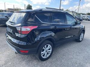 Black Ford Kuga 2016 in Panevezys, with an engine capacity of 1.50 L and mileage of 189 thousand km for 8000 €, photo 6 on AUTOMOTO.COM.LV