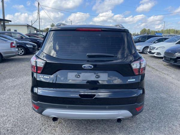 Black Ford Kuga 2016 in Panevezys, with an engine capacity of 1.50 L and mileage of 189 thousand km for 8000 €, photo 7 on AUTOMOTO.COM.LV