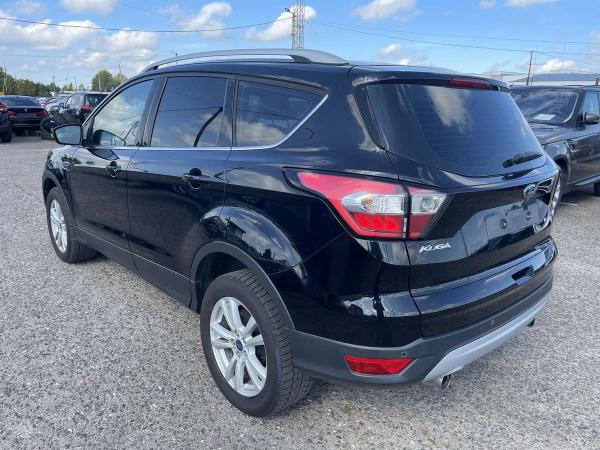 Black Ford Kuga 2016 in Panevezys, with an engine capacity of 1.50 L and mileage of 189 thousand km for 8000 €, photo 8 on AUTOMOTO.COM.LV