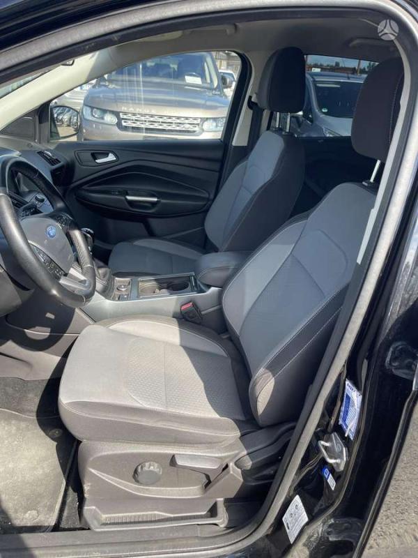 Black Ford Kuga 2016 in Panevezys, with an engine capacity of 1.50 L and mileage of 189 thousand km for 8000 €, photo 11 on AUTOMOTO.COM.LV