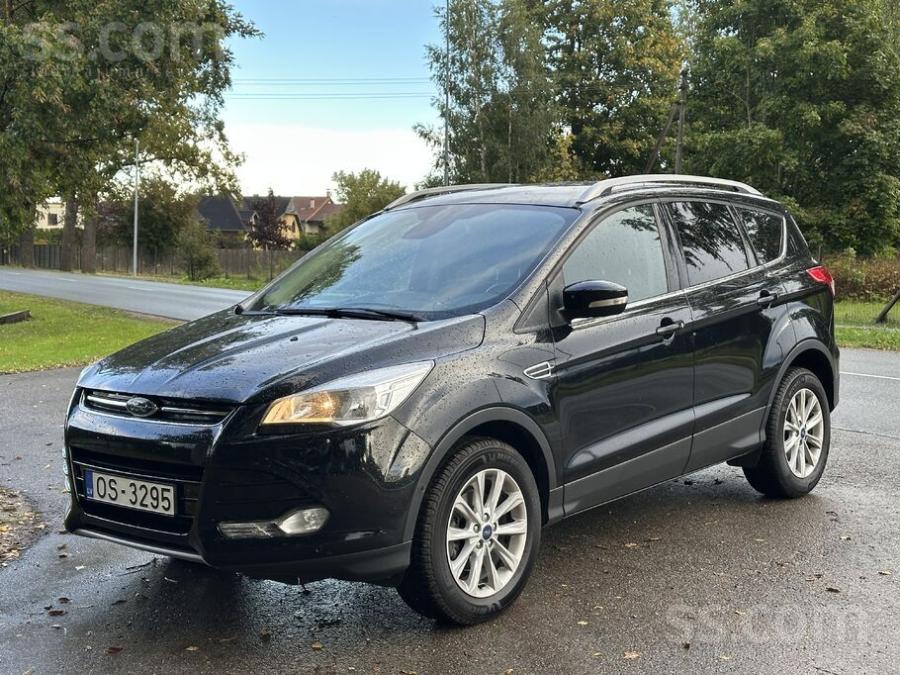 Black Ford Kuga 2016 in Riga, with an engine capacity of 1.50 L and mileage of 119 thousand km for 9990 €, photo 1 on AUTOMOTO.COM.LV