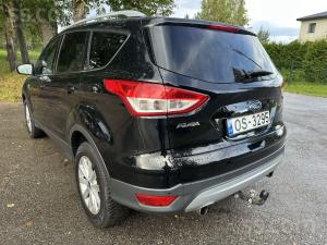 Black Ford Kuga 2016 in Riga, with an engine capacity of 1.50 L and mileage of 119 thousand km for 9990 €, photo 4 on AUTOMOTO.COM.LV