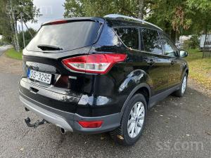 Black Ford Kuga 2016 in Riga, with an engine capacity of 1.50 L and mileage of 119 thousand km for 9990 €, photo 6 on AUTOMOTO.COM.LV