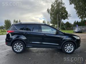 Black Ford Kuga 2016 in Riga, with an engine capacity of 1.50 L and mileage of 119 thousand km for 9990 €, photo 7 on AUTOMOTO.COM.LV