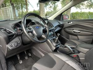 Black Ford Kuga 2016 in Riga, with an engine capacity of 1.50 L and mileage of 119 thousand km for 9990 €, photo 10 on AUTOMOTO.COM.LV