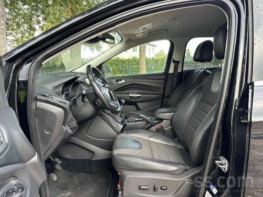 Black Ford Kuga 2016 in Riga, with an engine capacity of 1.50 L and mileage of 119 thousand km for 9990 €, photo 11 on AUTOMOTO.COM.LV