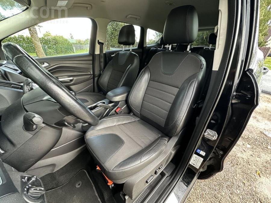 Black Ford Kuga 2016 in Riga, with an engine capacity of 1.50 L and mileage of 119 thousand km for 9990 €, photo 12 on AUTOMOTO.COM.LV