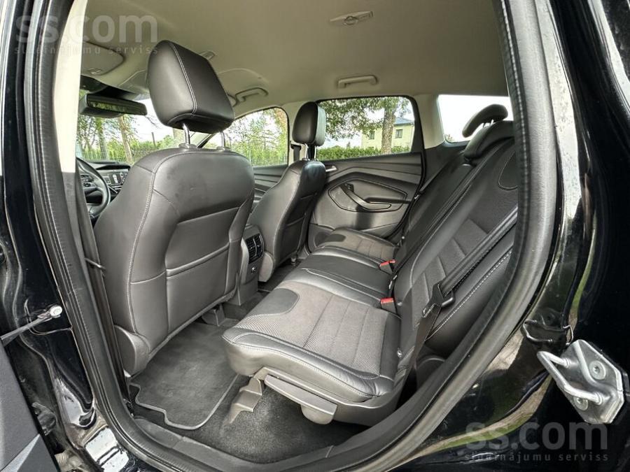 Black Ford Kuga 2016 in Riga, with an engine capacity of 1.50 L and mileage of 119 thousand km for 9990 €, photo 13 on AUTOMOTO.COM.LV