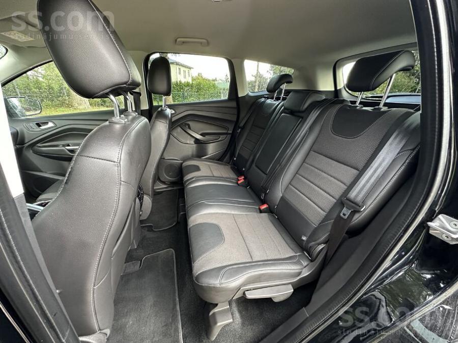 Black Ford Kuga 2016 in Riga, with an engine capacity of 1.50 L and mileage of 119 thousand km for 9990 €, photo 14 on AUTOMOTO.COM.LV