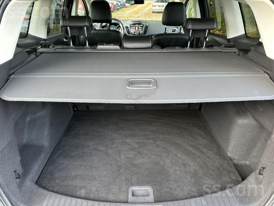 Black Ford Kuga 2016 in Riga, with an engine capacity of 1.50 L and mileage of 119 thousand km for 9990 €, photo 15 on AUTOMOTO.COM.LV
