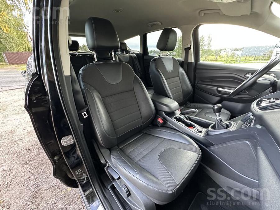 Black Ford Kuga 2016 in Riga, with an engine capacity of 1.50 L and mileage of 119 thousand km for 9990 €, photo 19 on AUTOMOTO.COM.LV