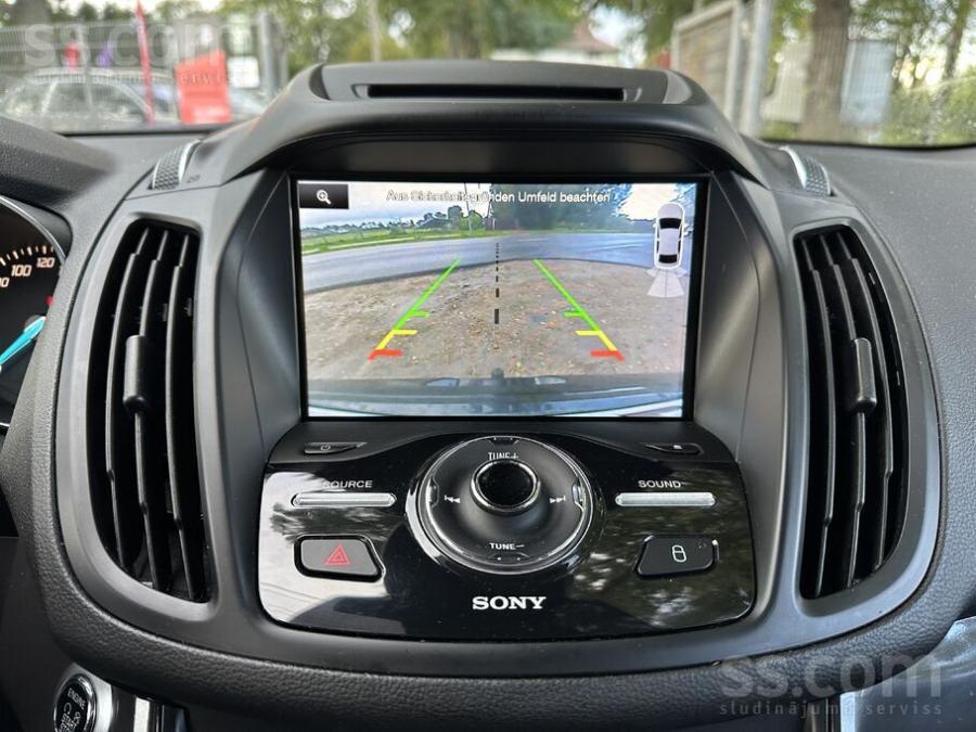 Black Ford Kuga 2016 in Riga, with an engine capacity of 1.50 L and mileage of 119 thousand km for 9990 €, photo 25 on AUTOMOTO.COM.LV