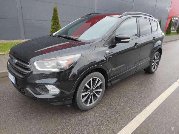 Black Ford Kuga 2017 in Panevezys, with an engine capacity of 1.50 L and mileage of 256 thousand km for 9900 €, photo 2 on AUTOMOTO.COM.LV
