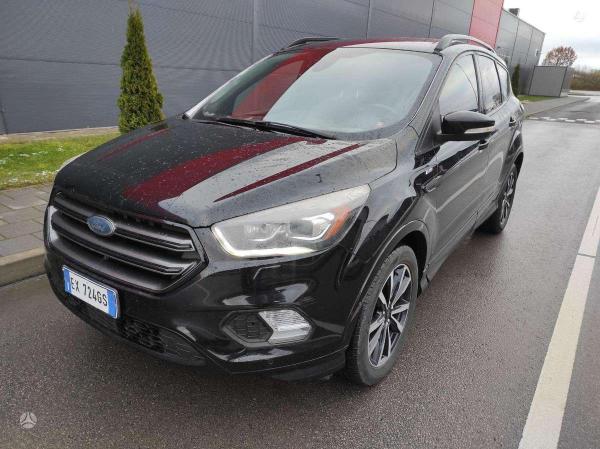 Black Ford Kuga 2017 in Panevezys, with an engine capacity of 1.50 L and mileage of 256 thousand km for 9900 €, photo 3 on AUTOMOTO.COM.LV