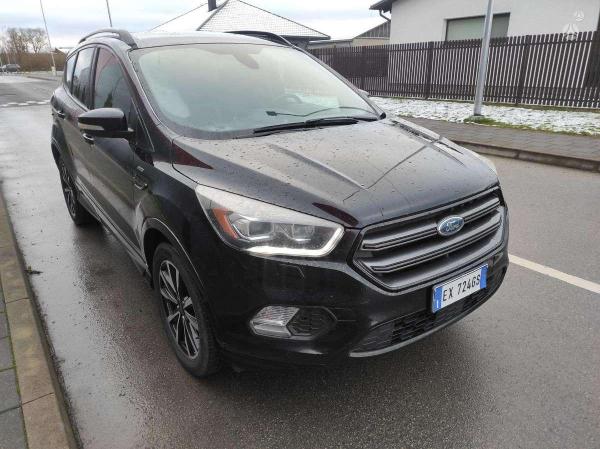 Black Ford Kuga 2017 in Panevezys, with an engine capacity of 1.50 L and mileage of 256 thousand km for 9900 €, photo 5 on AUTOMOTO.COM.LV