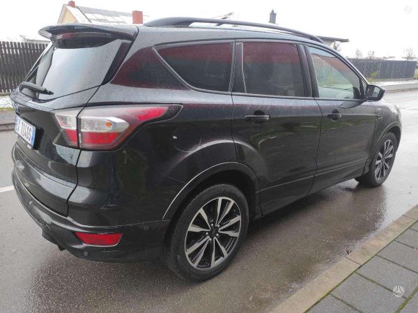 Black Ford Kuga 2017 in Panevezys, with an engine capacity of 1.50 L and mileage of 256 thousand km for 9900 €, photo 8 on AUTOMOTO.COM.LV