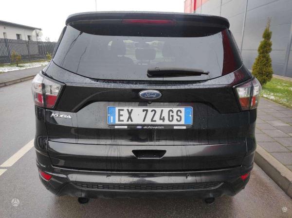 Black Ford Kuga 2017 in Panevezys, with an engine capacity of 1.50 L and mileage of 256 thousand km for 9900 €, photo 10 on AUTOMOTO.COM.LV
