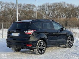 Black Ford Kuga 2017 in Taurage, with an engine capacity of 2.00 L and mileage of 203 thousand km for 10900 €, photo 5 on AUTOMOTO.COM.LV