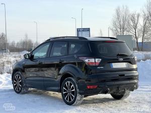 Black Ford Kuga 2017 in Taurage, with an engine capacity of 2.00 L and mileage of 203 thousand km for 10900 €, photo 8 on AUTOMOTO.COM.LV