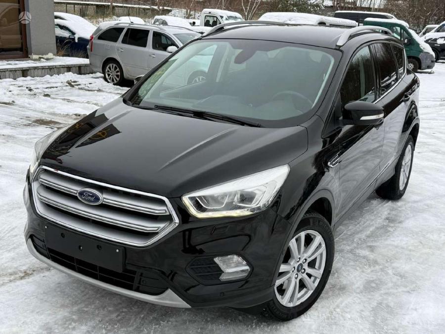 Black Ford Kuga 2017 in Utena, with an engine capacity of 1.50 L and mileage of 106 thousand km for 11250 €, photo 1 on AUTOMOTO.COM.LV