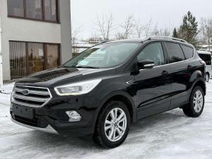 Black Ford Kuga 2017 in Utena, with an engine capacity of 1.50 L and mileage of 106 thousand km for 11250 €, photo 2 on AUTOMOTO.COM.LV