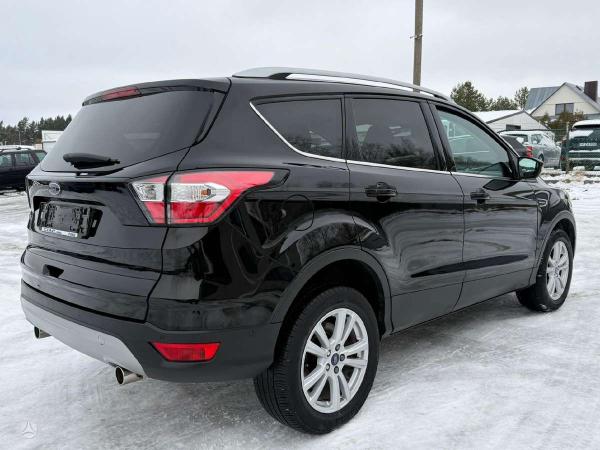 Black Ford Kuga 2017 in Utena, with an engine capacity of 1.50 L and mileage of 106 thousand km for 11250 €, photo 4 on AUTOMOTO.COM.LV