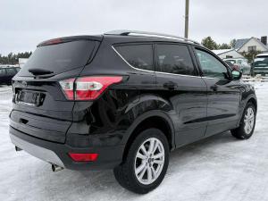 Black Ford Kuga 2017 in Utena, with an engine capacity of 1.50 L and mileage of 106 thousand km for 11250 €, photo 4 on AUTOMOTO.COM.LV