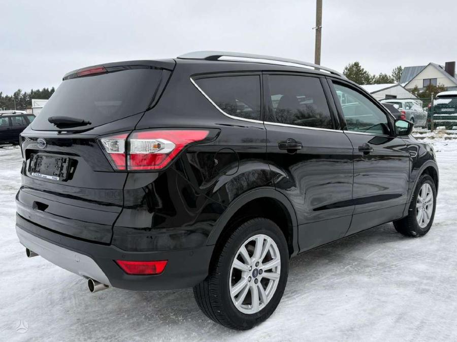 Black Ford Kuga 2017 in Utena, with an engine capacity of 1.50 L and mileage of 106 thousand km for 11250 €, photo 4 on AUTOMOTO.COM.LV