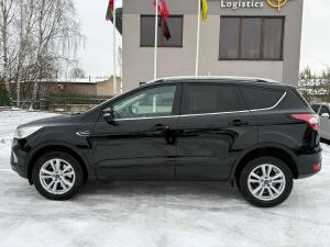 Black Ford Kuga 2017 in Utena, with an engine capacity of 1.50 L and mileage of 106 thousand km for 11250 €, photo 6 on AUTOMOTO.COM.LV