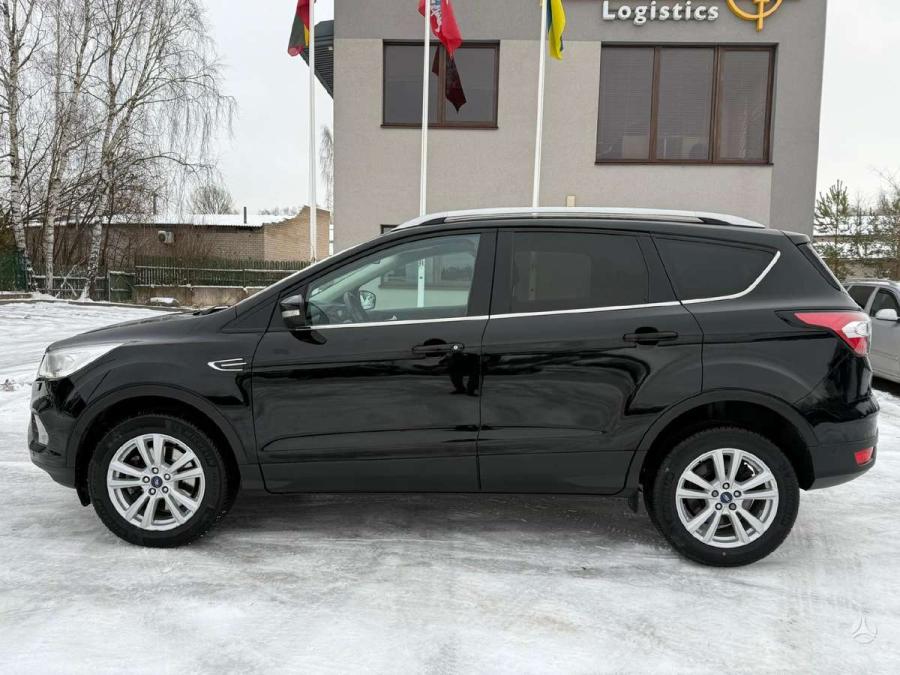 Black Ford Kuga 2017 in Utena, with an engine capacity of 1.50 L and mileage of 106 thousand km for 11250 €, photo 6 on AUTOMOTO.COM.LV