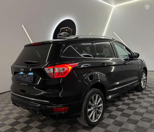 Black Ford Kuga 2017 in Marijampole, with an engine capacity of 2.00 L and mileage of 220 thousand km for 12999 €, photo 29 on AUTOMOTO.COM.LV