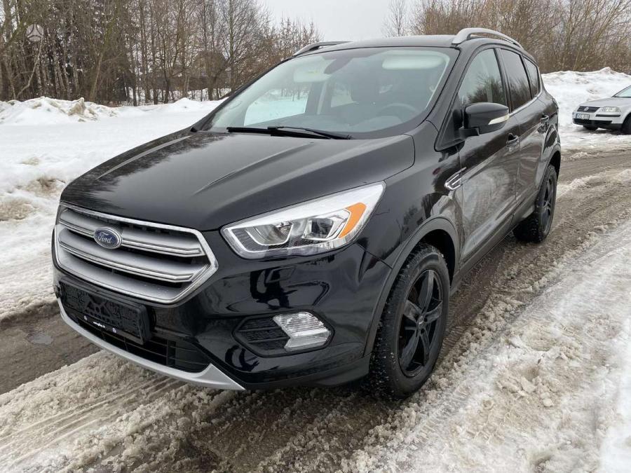 Black Ford Kuga 2017 in Panevezys, with an engine capacity of 2.00 L and mileage of 295 thousand km for 8800 €, photo 1 on AUTOMOTO.COM.LV