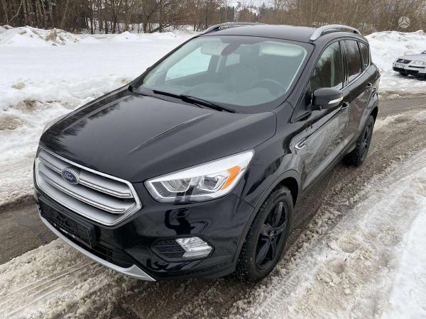 Black Ford Kuga 2017 in Panevezys, with an engine capacity of 2.00 L and mileage of 295 thousand km for 8800 €, photo 2 on AUTOMOTO.COM.LV