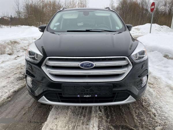 Black Ford Kuga 2017 in Panevezys, with an engine capacity of 2.00 L and mileage of 295 thousand km for 8800 €, photo 3 on AUTOMOTO.COM.LV