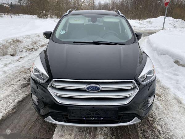 Black Ford Kuga 2017 in Panevezys, with an engine capacity of 2.00 L and mileage of 295 thousand km for 8800 €, photo 4 on AUTOMOTO.COM.LV