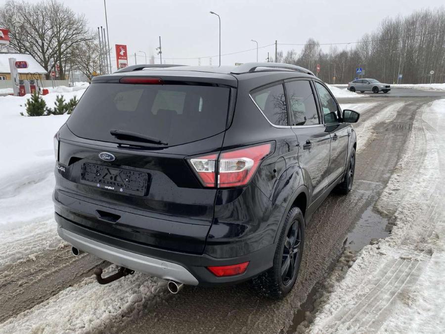 Black Ford Kuga 2017 in Panevezys, with an engine capacity of 2.00 L and mileage of 295 thousand km for 8800 €, photo 6 on AUTOMOTO.COM.LV
