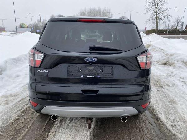 Black Ford Kuga 2017 in Panevezys, with an engine capacity of 2.00 L and mileage of 295 thousand km for 8800 €, photo 7 on AUTOMOTO.COM.LV